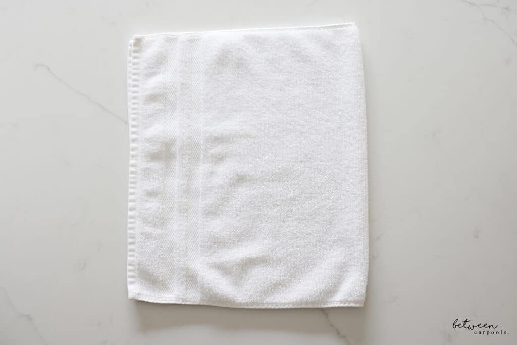How to Fold Towels So They’re Always Pretty and Neat - Between Carpools
